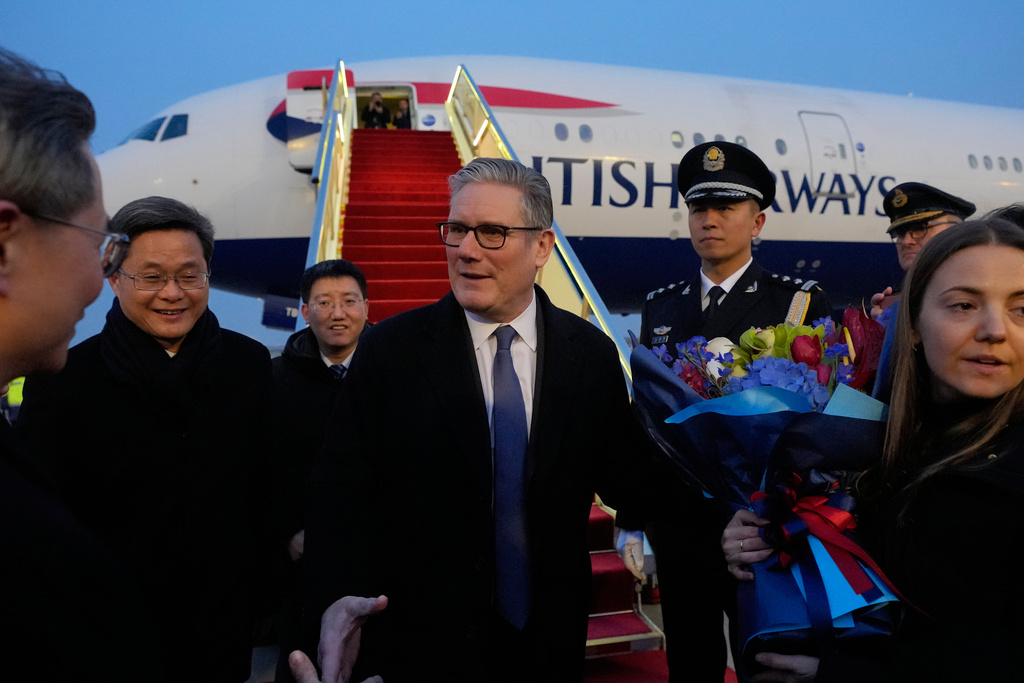 British leader's trip to China is a balancing act between trade ...