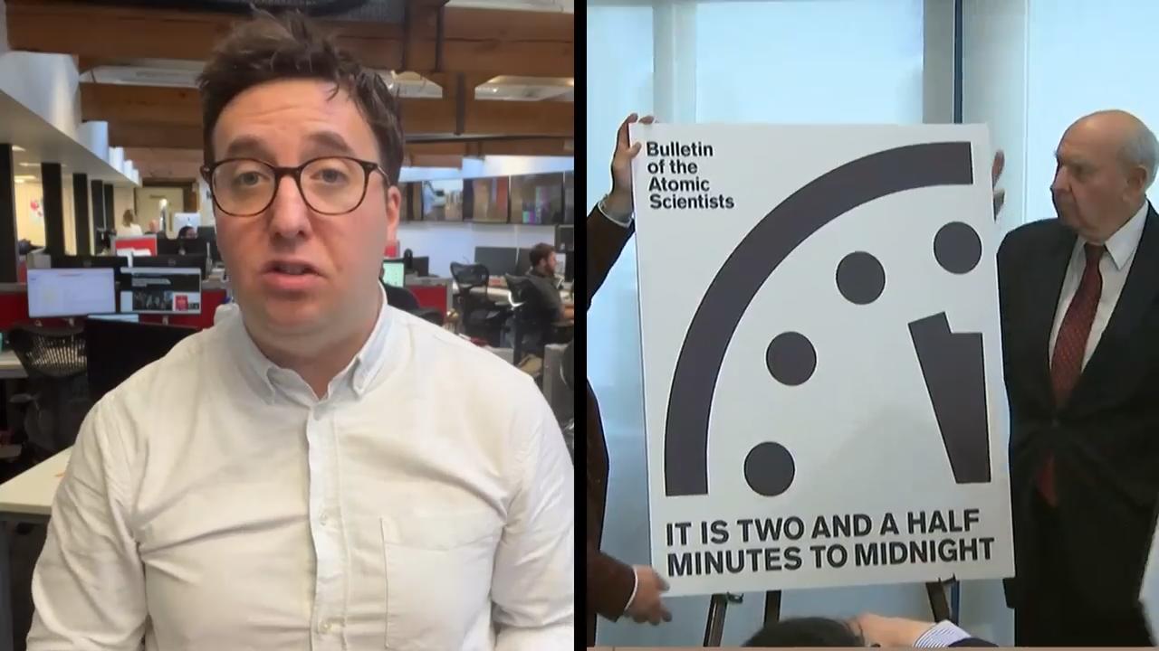 What is the doomsday clock, and what does it mean when it gets to midnight?