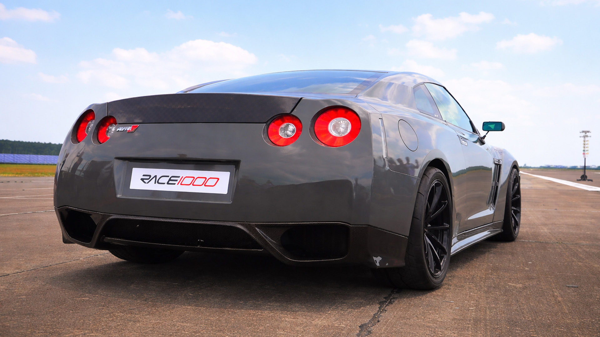 Performance cars face off in high speed drag races