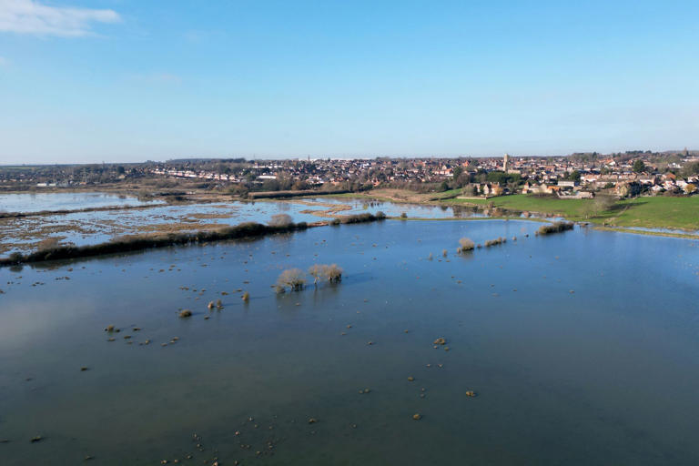 Heavy rain set for UK as floods continue to cause disruption: latest