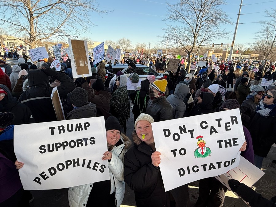 Large crowd of protesters gathered in Iowa ahead of presidential visit