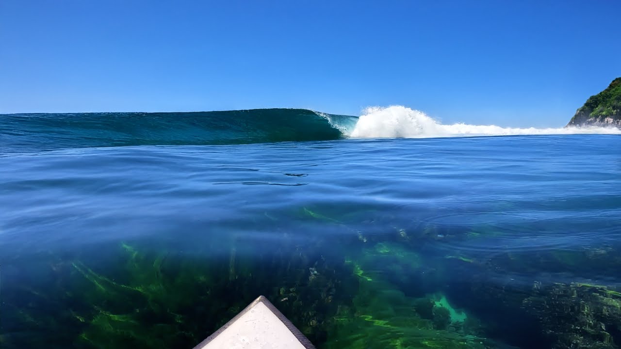 He found a perfect reef wave… where falling isn’t an option