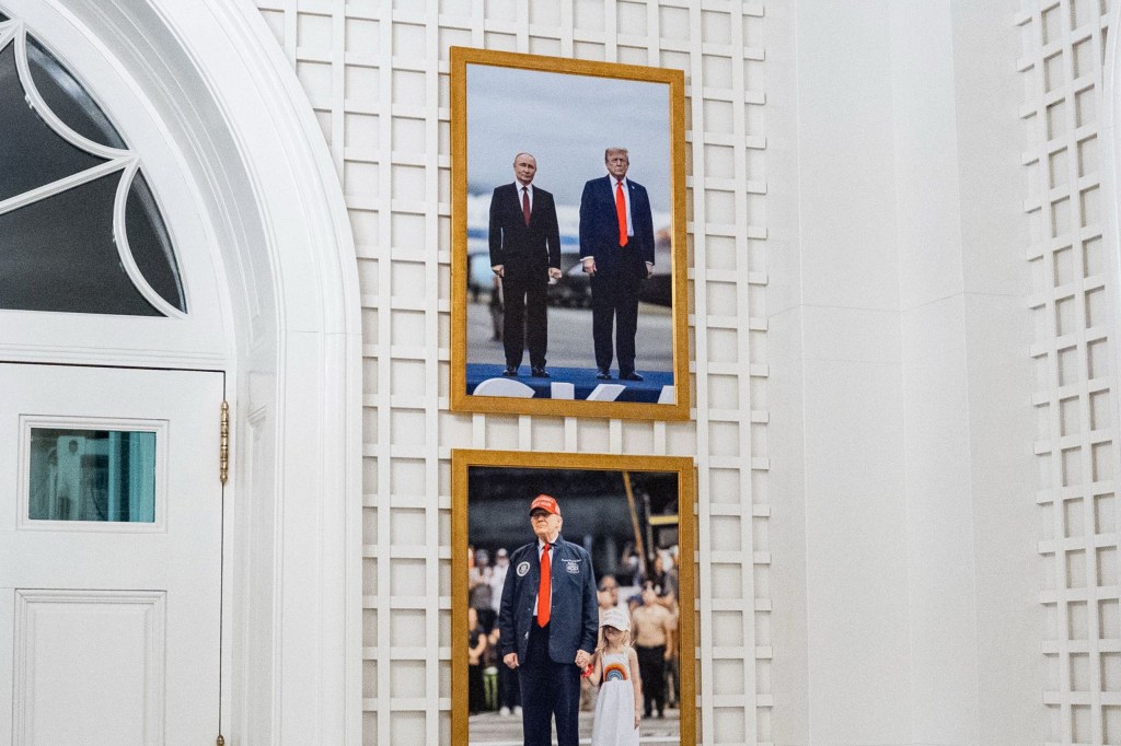 Trump frames photo of himself and Putin above snap with granddaughter