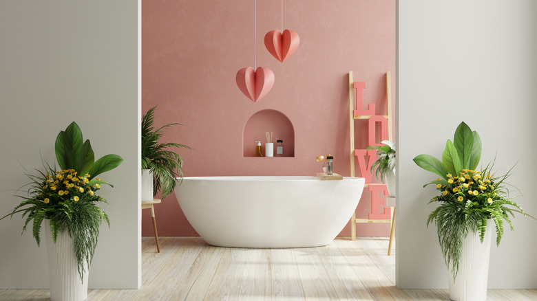 Bring Valentine's Day decor into the bathroom with this towel folding trick