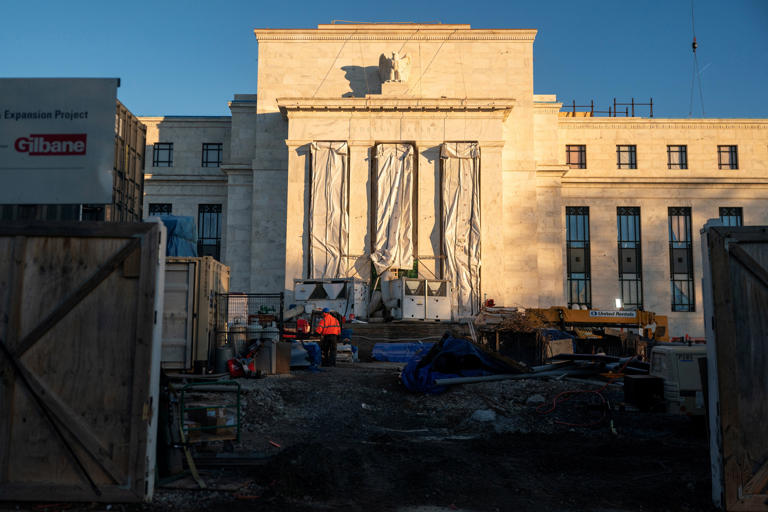 US Federal Reserve holds interest rates steady despite political pressure