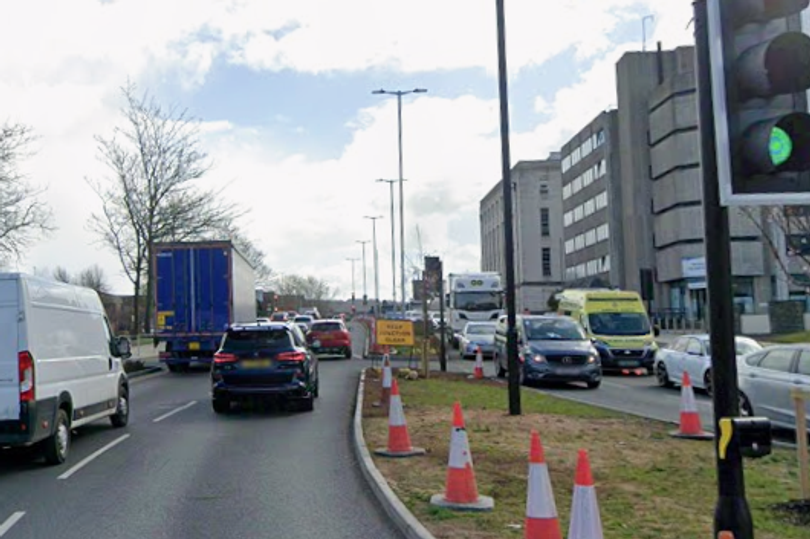 Woman fights for life as man in 20s arrested after Audi hit-and-run