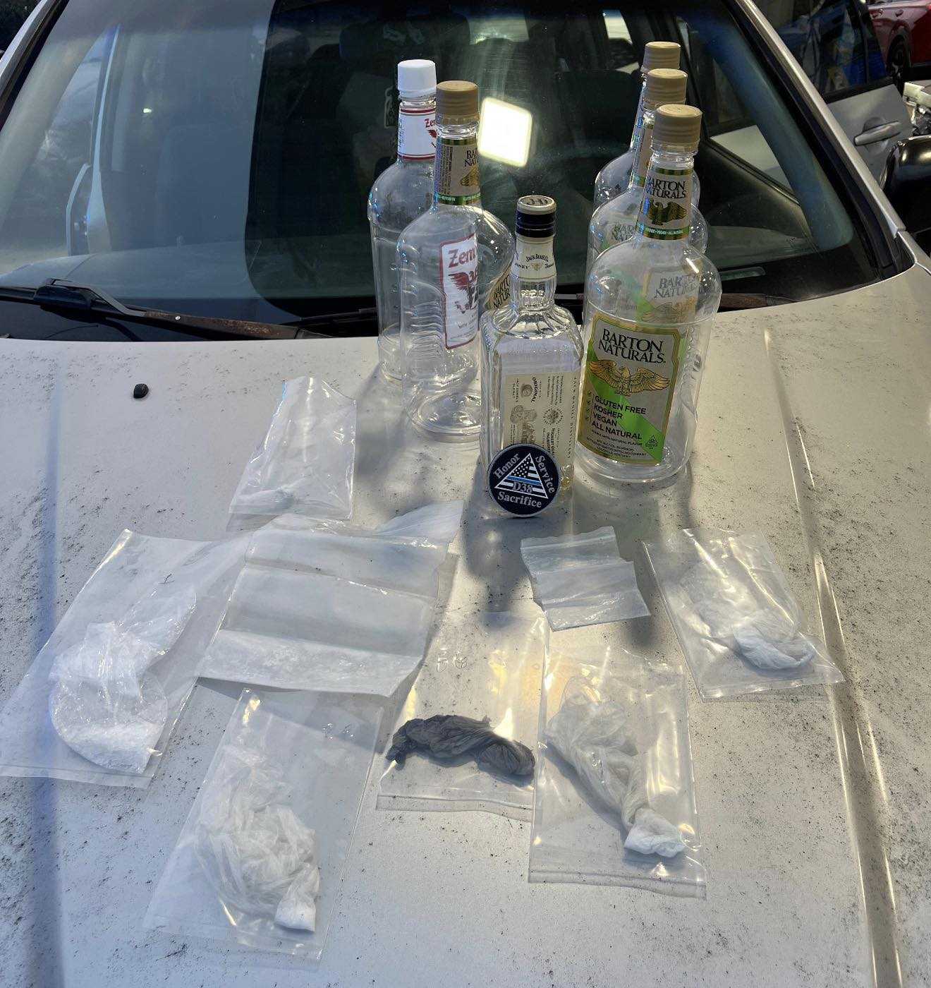 GCSO: Woman arrested after 6 open liquor bottles, drugs, stolen debit ...