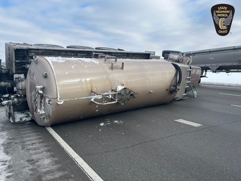 I-75 crash: GMC spins out, Peterbilt truck flips over