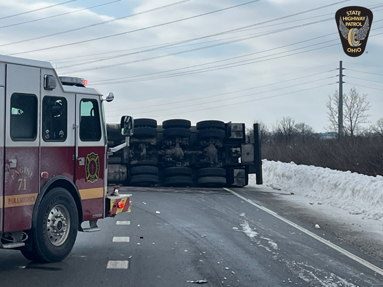 I-75 crash: GMC spins out, Peterbilt truck flips over