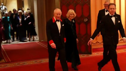 King and Queen arrive for Windsor Castle film premiere