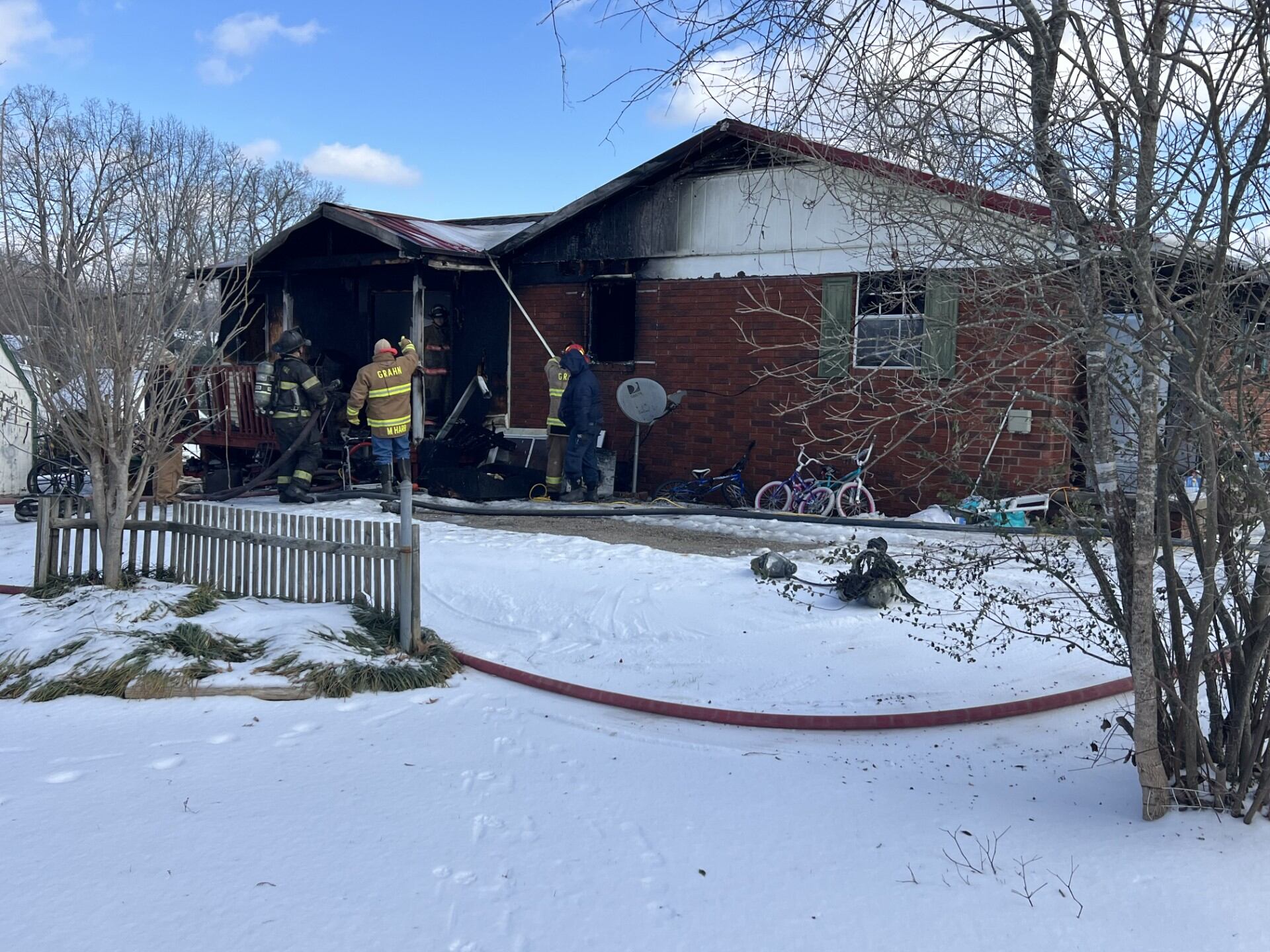 Woman rescued out of burning home