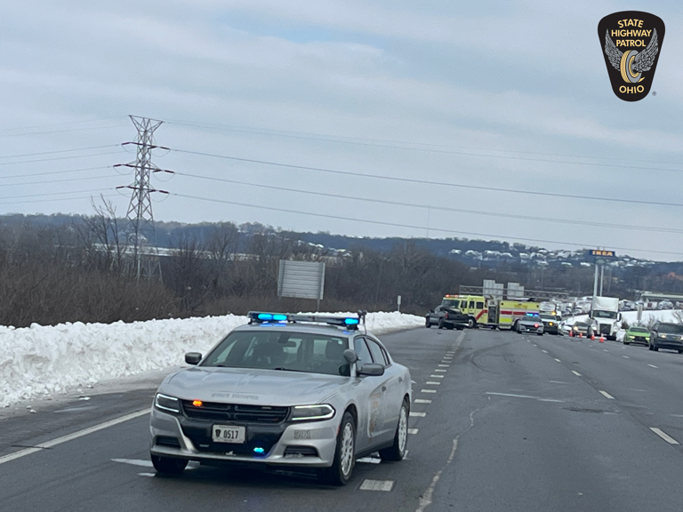 I-75 crash: GMC spins out, Peterbilt truck flips over