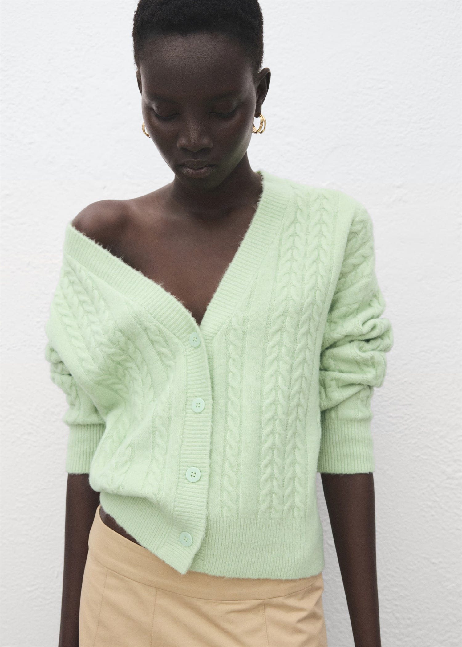 This cable knit cardigan from Mango is the perfect spring shade