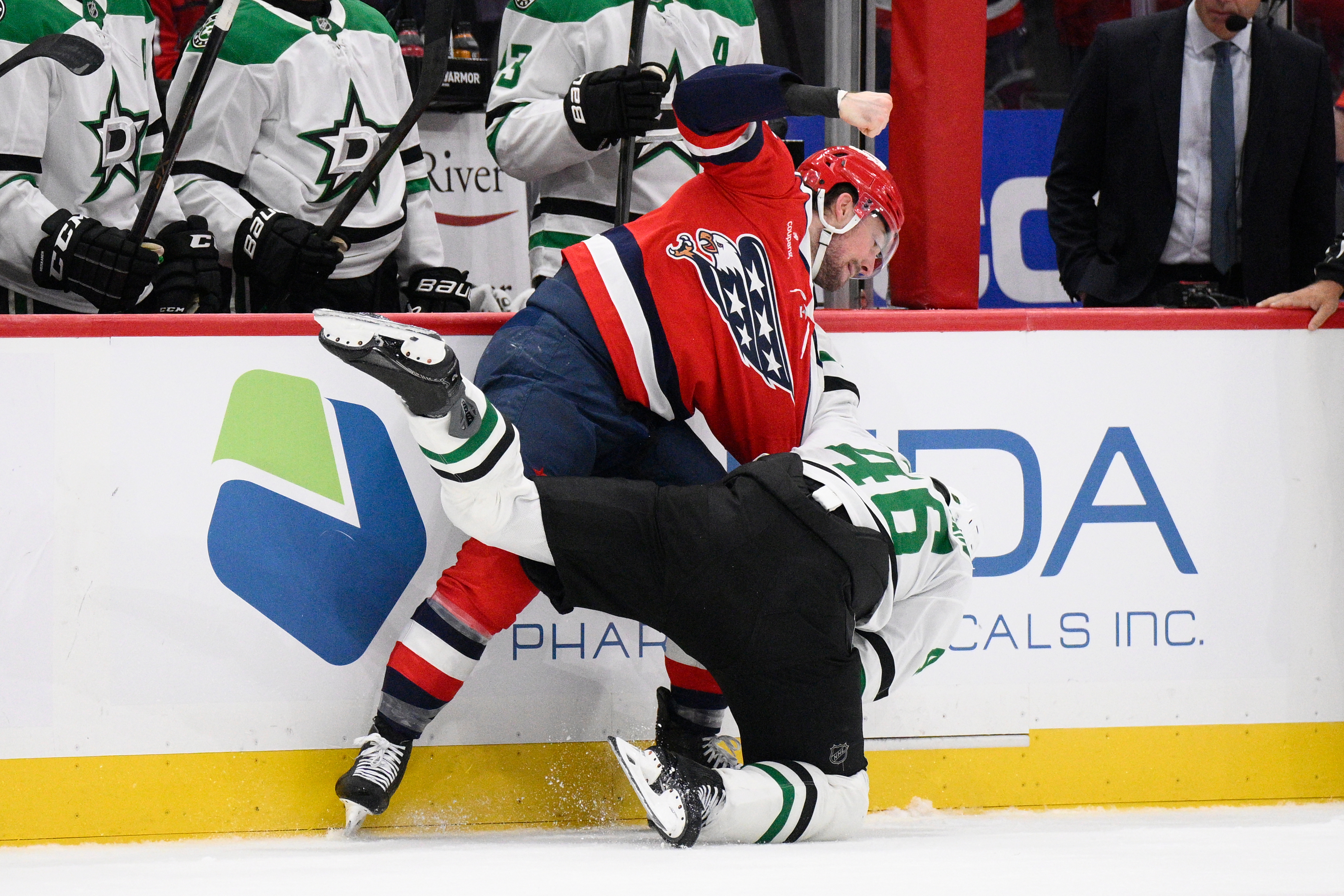 Capitals' Brandon Duhaime fined for poking Kraken's Jacob Melanson from ...