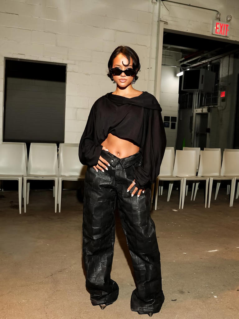 Black pants are no longer basic—and that’s the point