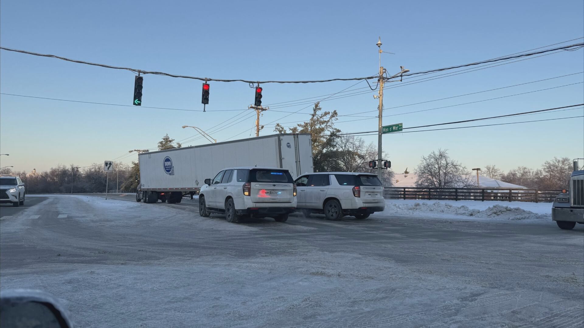 Semi trucks sliding off icy roads across central Kentucky