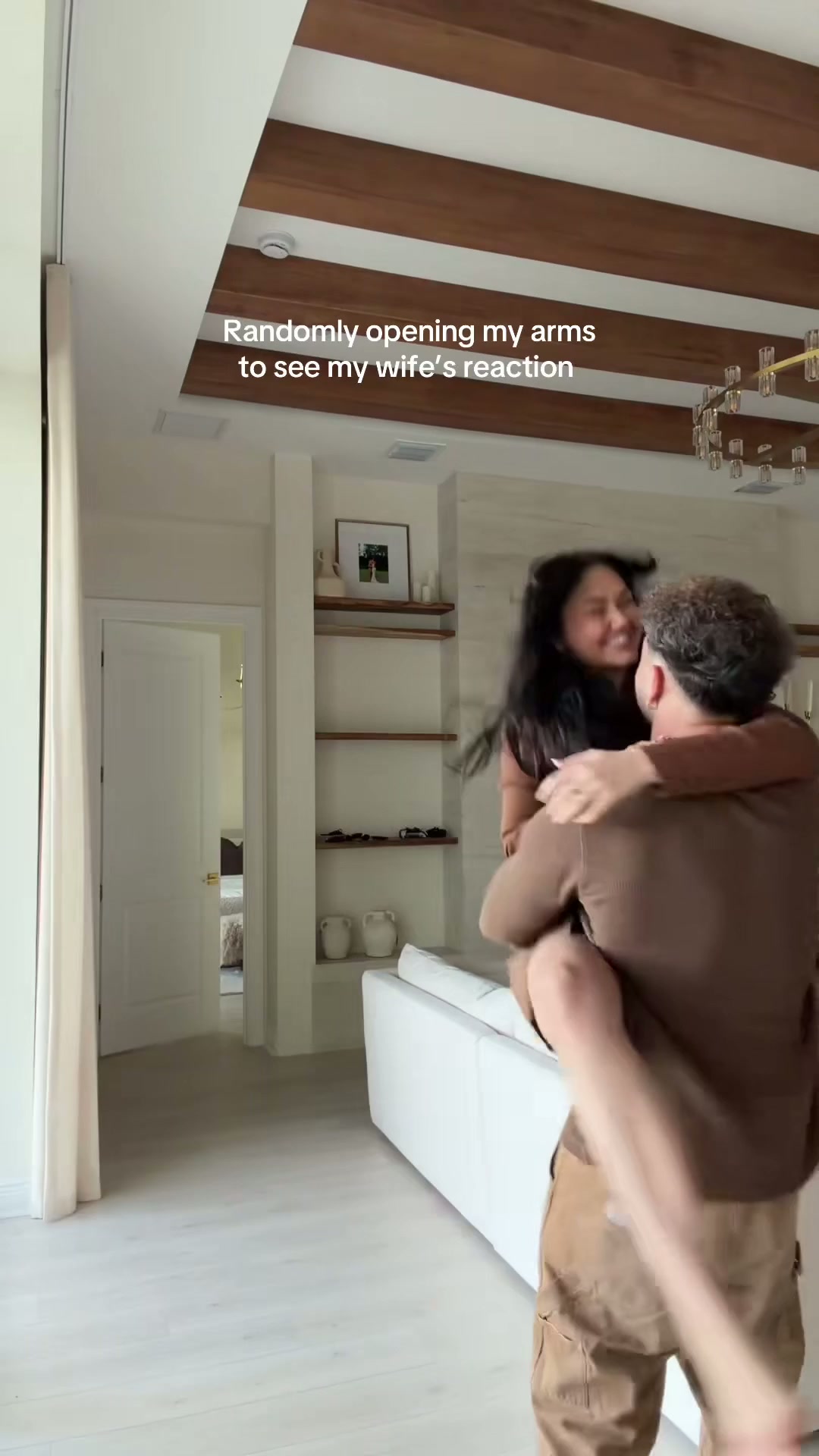 Randomly opening my arms to see my wife’s reaction