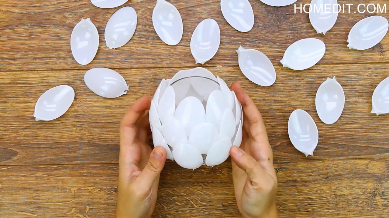 Gilded candle holder from plastic spoons