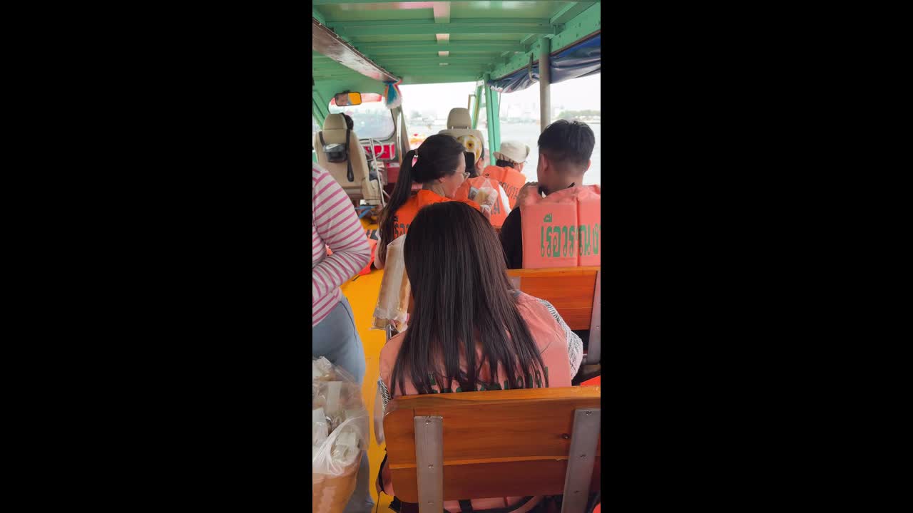 Catfish go wild for bread thrown from boat into river