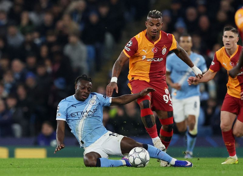 Soccer - Man City clinch Champions League last-16 spot with win over ...