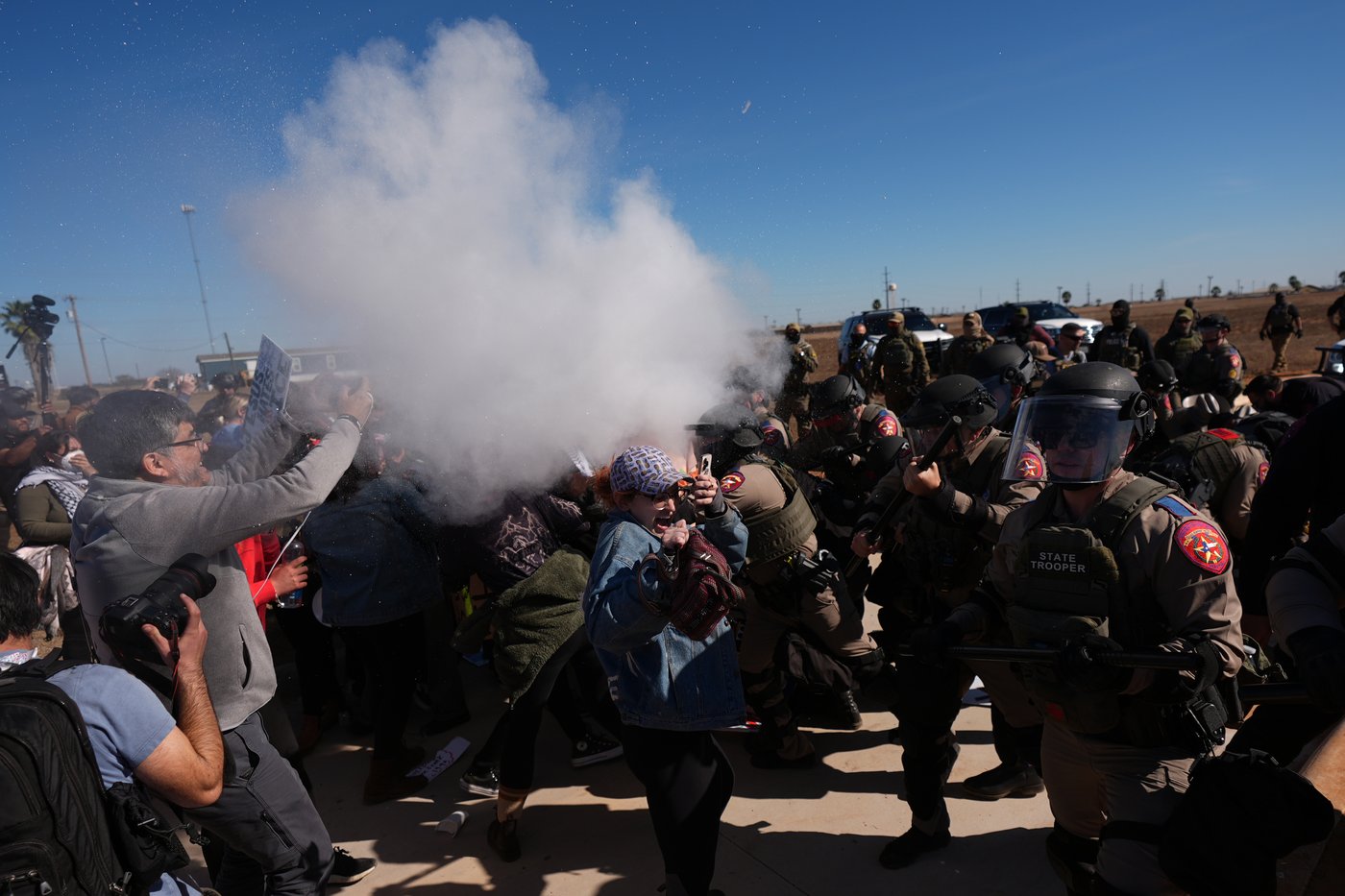 Officers confront protesters at Texas facility as lawmaker visits ...