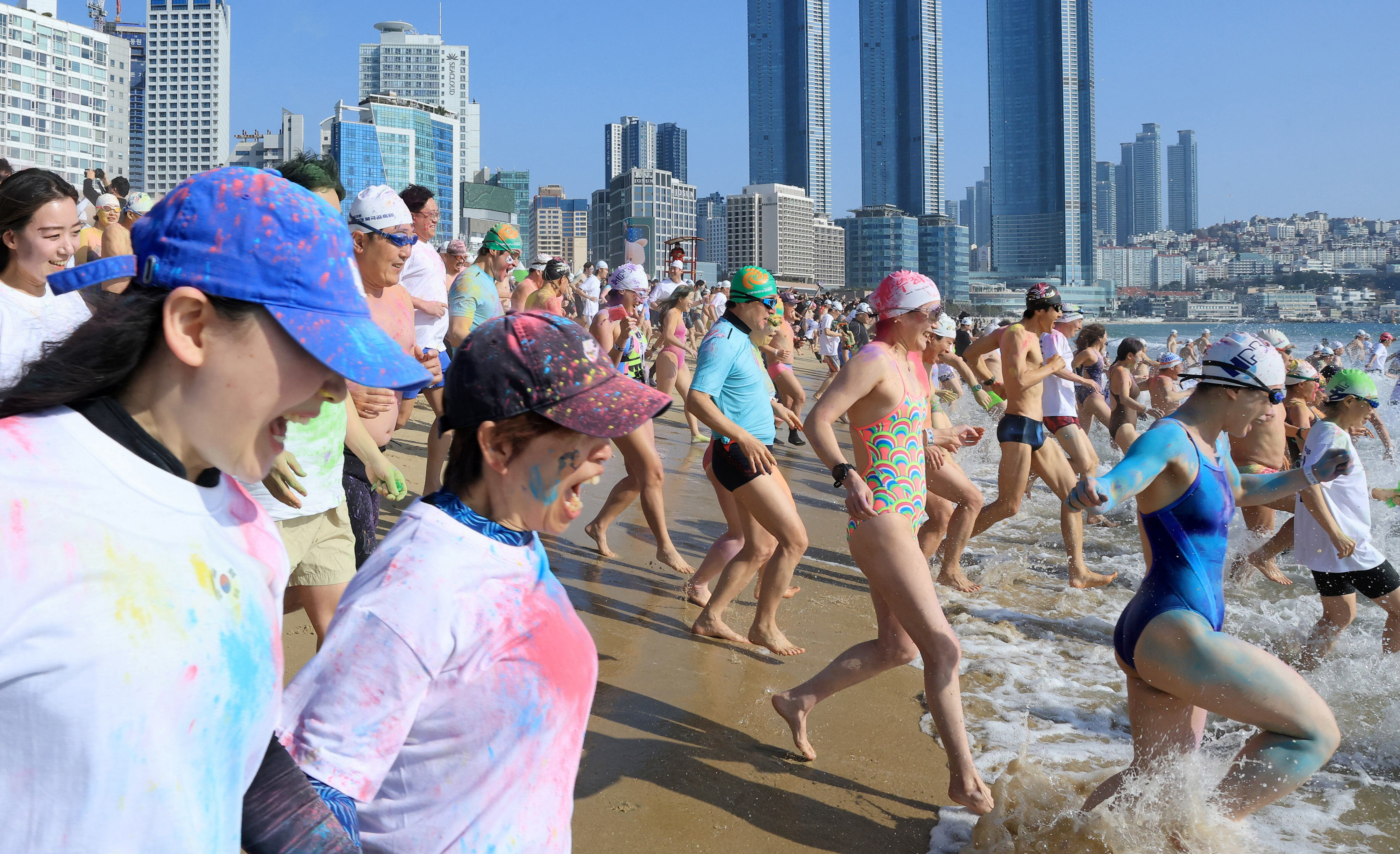 Busan's polar bear swimmers brave winter sea in renewal ritual