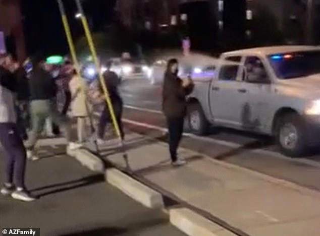 Shocking video shows federal officer spray protesters from moving truck ...