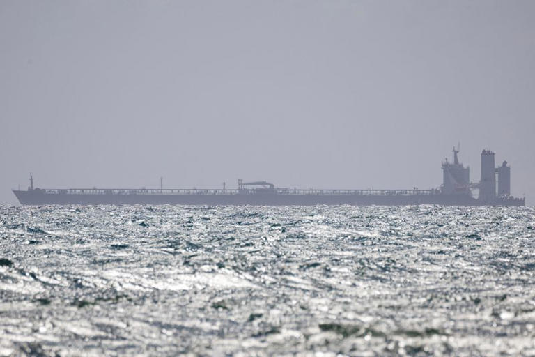 Exclusive - US handing over seized tanker to Venezuela, officials say