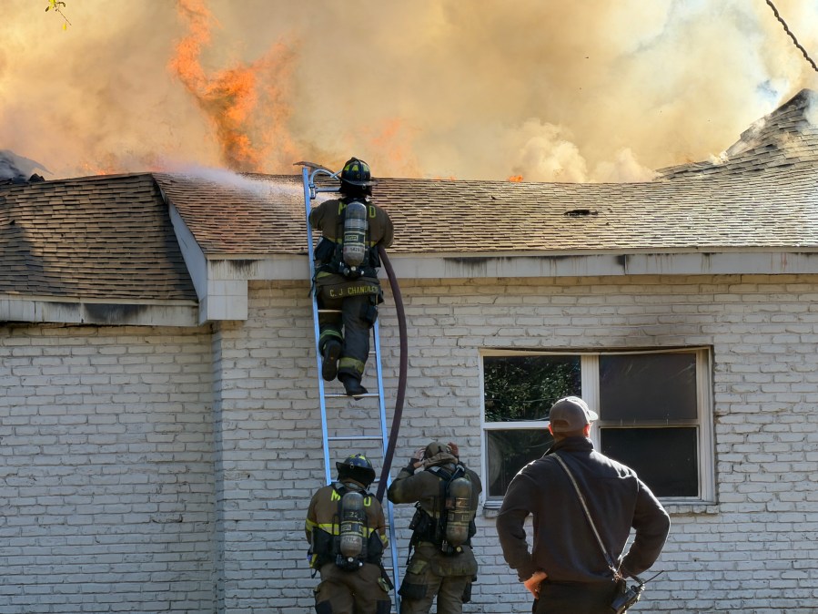 Community rallies around neighbor after house fire in Mobile
