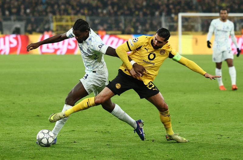 Soccer-Inter Milan beat Dortmund 2-0 but both teams end up in playoffs