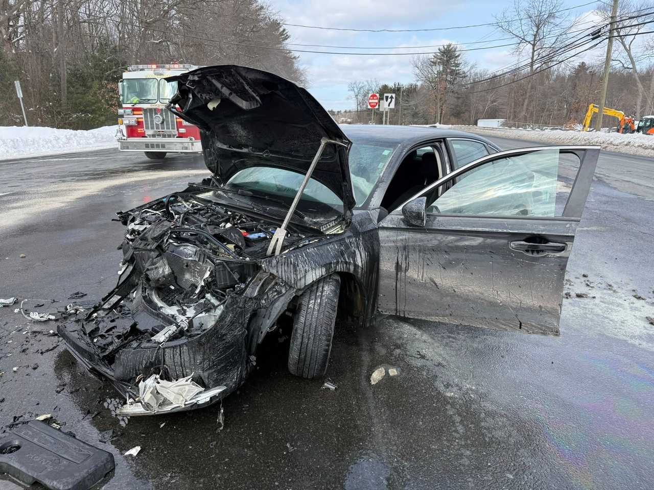 CT driver hurt after car-truck crash sparks engine fire