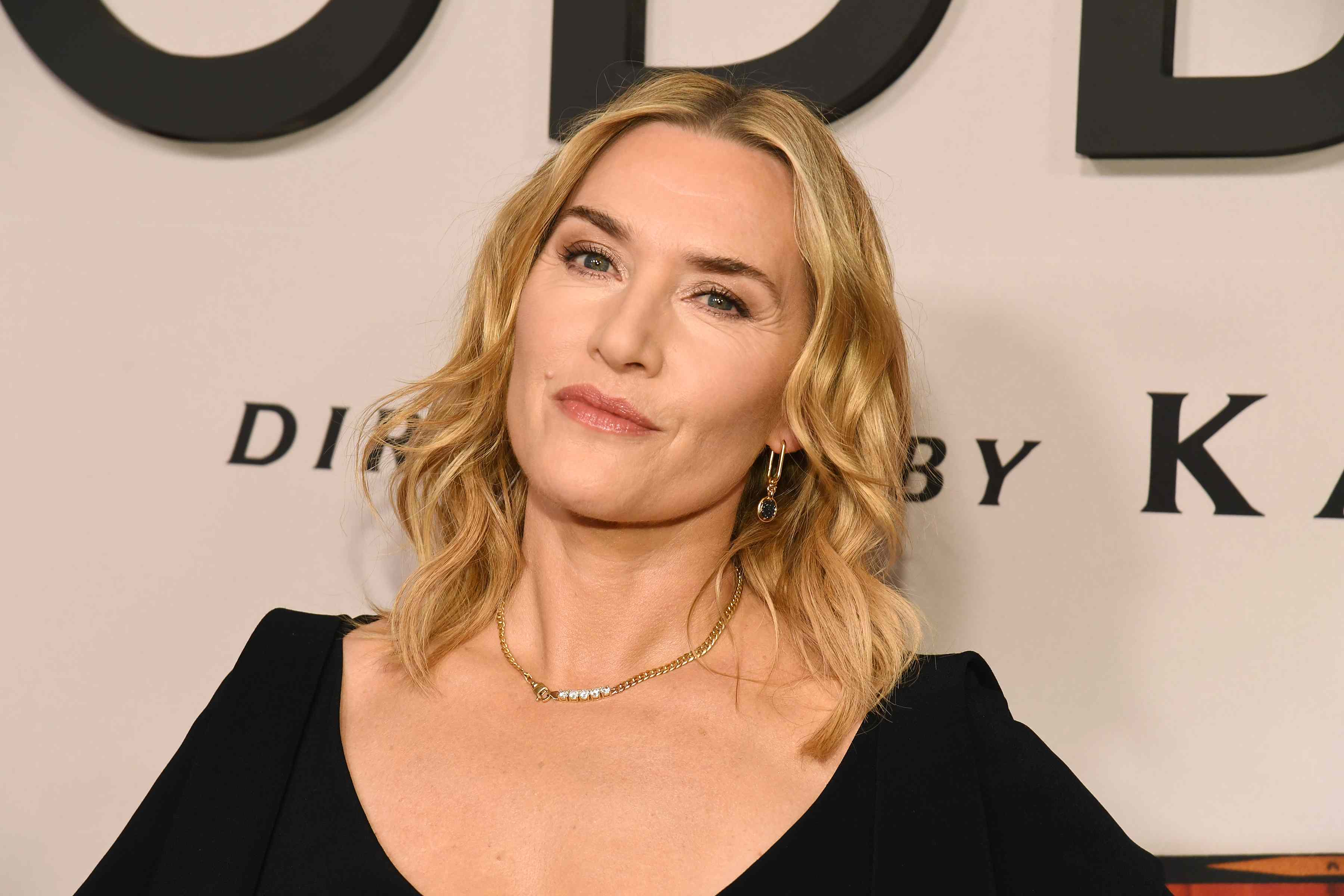 Kate Winslet pairs a deep millennial side part with her bedazzled ...