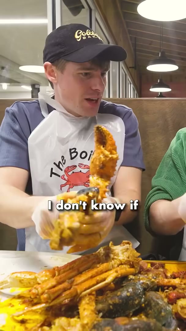 Two Brits try king crab leg from American seafood boil!