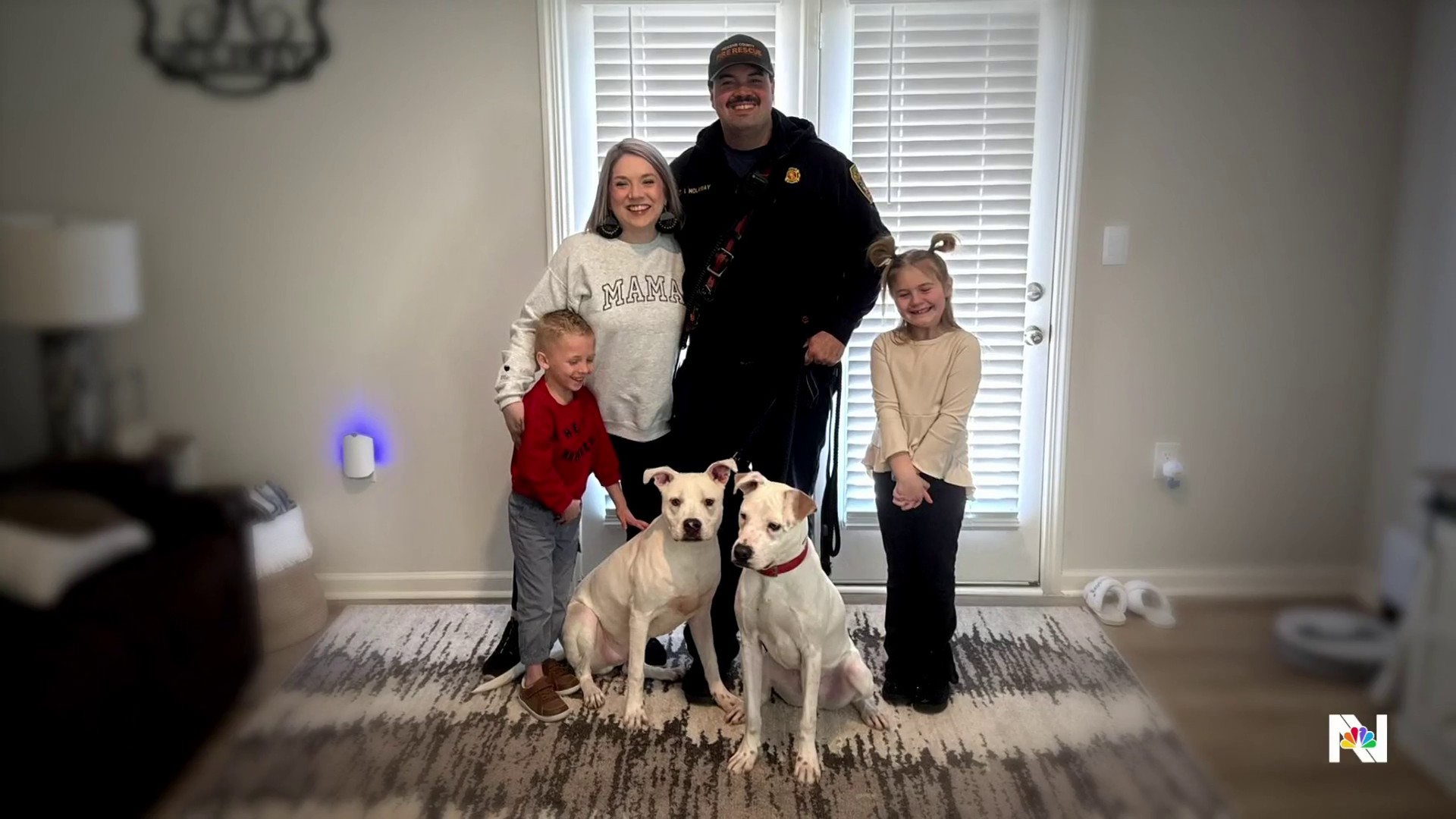 Firefighter who saved puppies in house fire adopts them