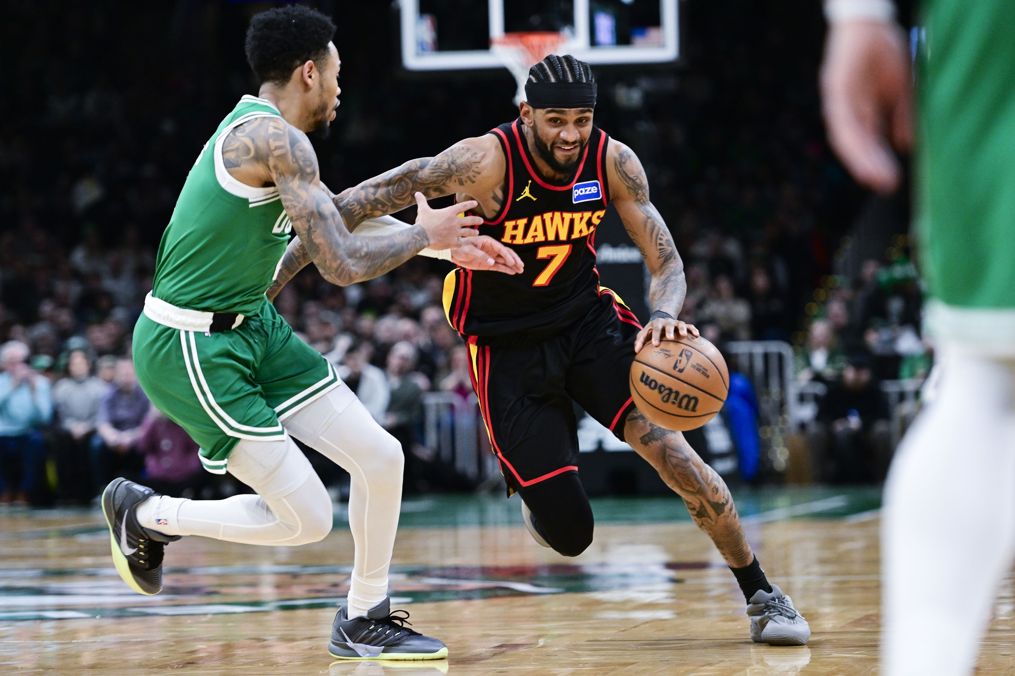Balanced scoring leads Hawks to 117-106 win against the Celtics