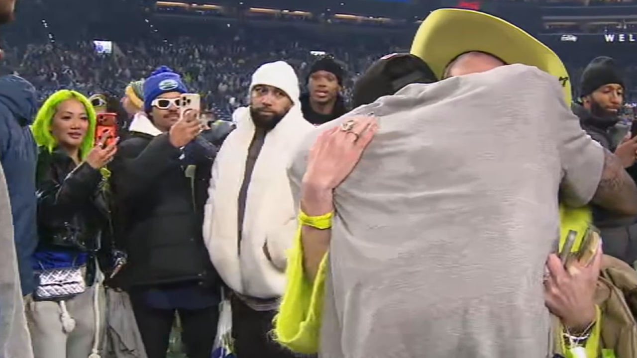 Who's the girl with green hair at the Seattle Seahawks game?