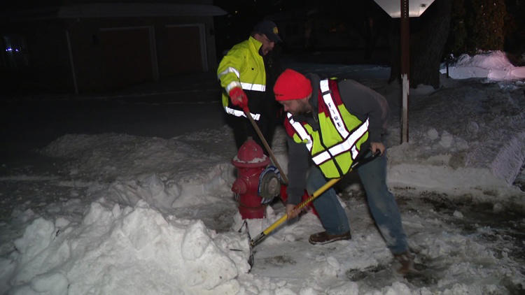 Crews clear snow from fire hydrants in Dallas