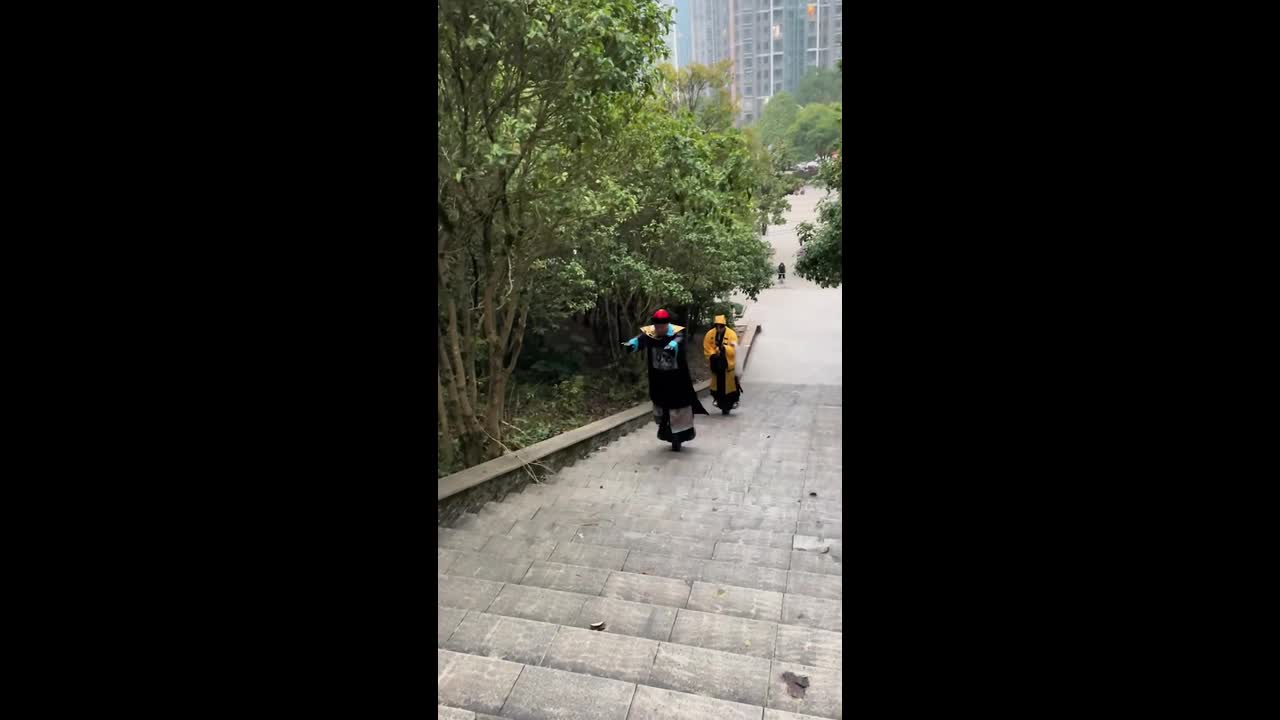 Zombie and priest take their supernatural chase to a mountain staircase