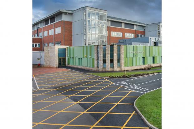 Main entrance to hospital's emergency department opens