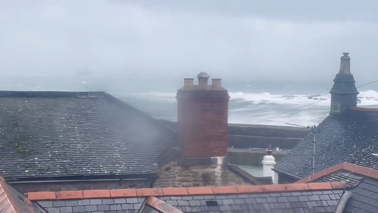 Massive waves batter Mousehole harbor during Storm Chandra in Mousehole ...