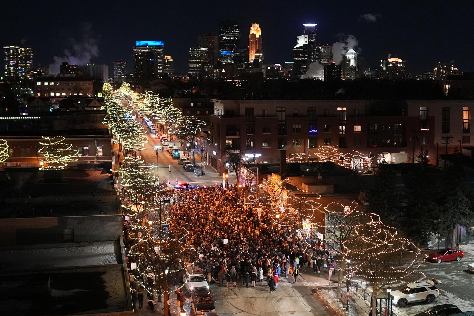 Hundreds gather in the cold for Minneapolis vigil in honor of intensive ...