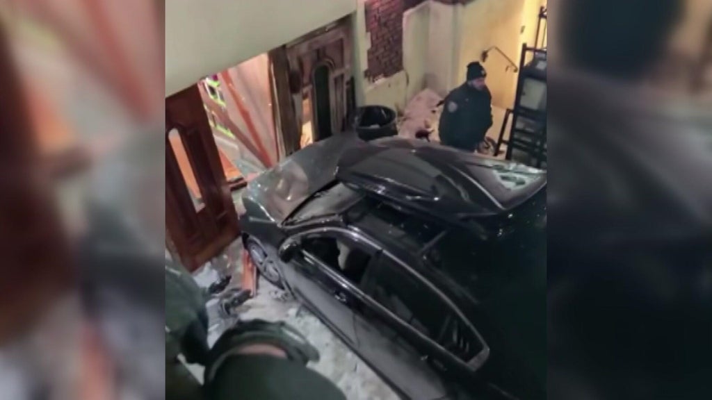 Driver in custody after car crashes into Chabad headquarters in ...