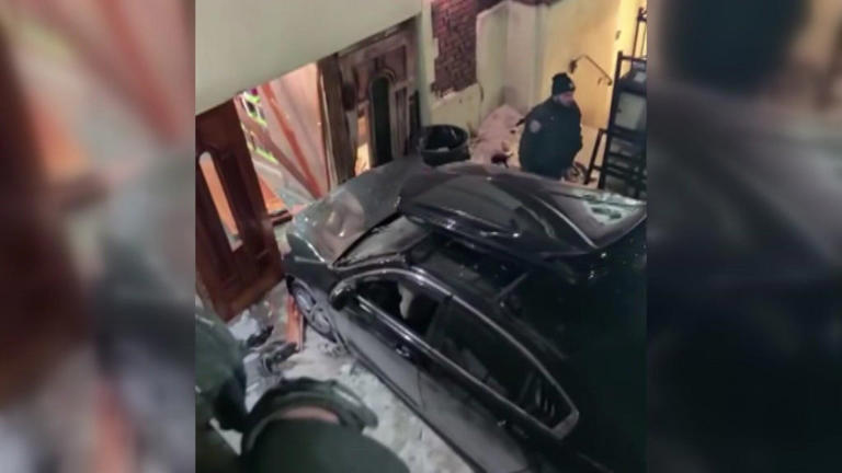 Driver in custody after car crashes into Chabad headquarters in ...