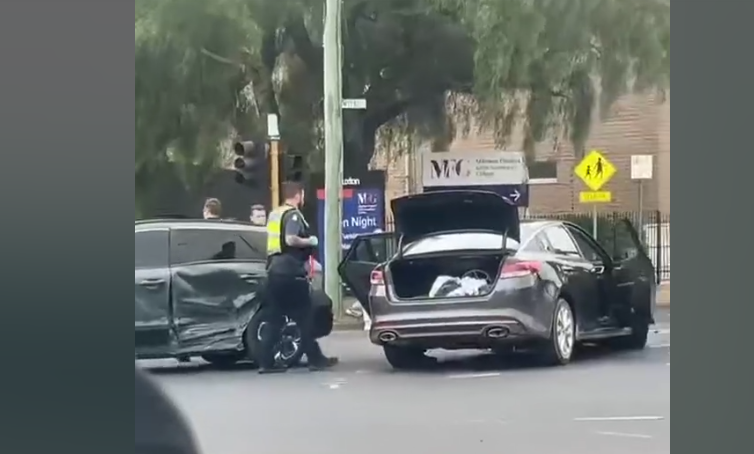 Man shot by police outside Victorian school after stolen car crashes ...