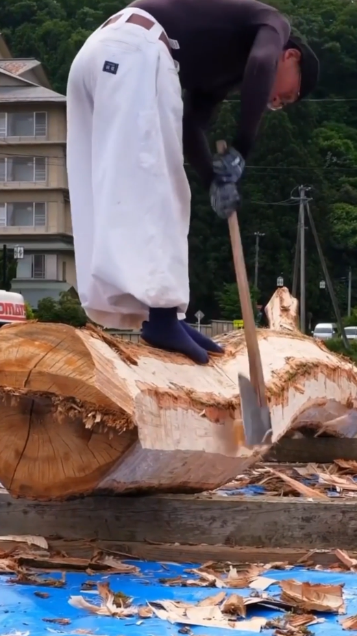 A Japanese master carpenter in action