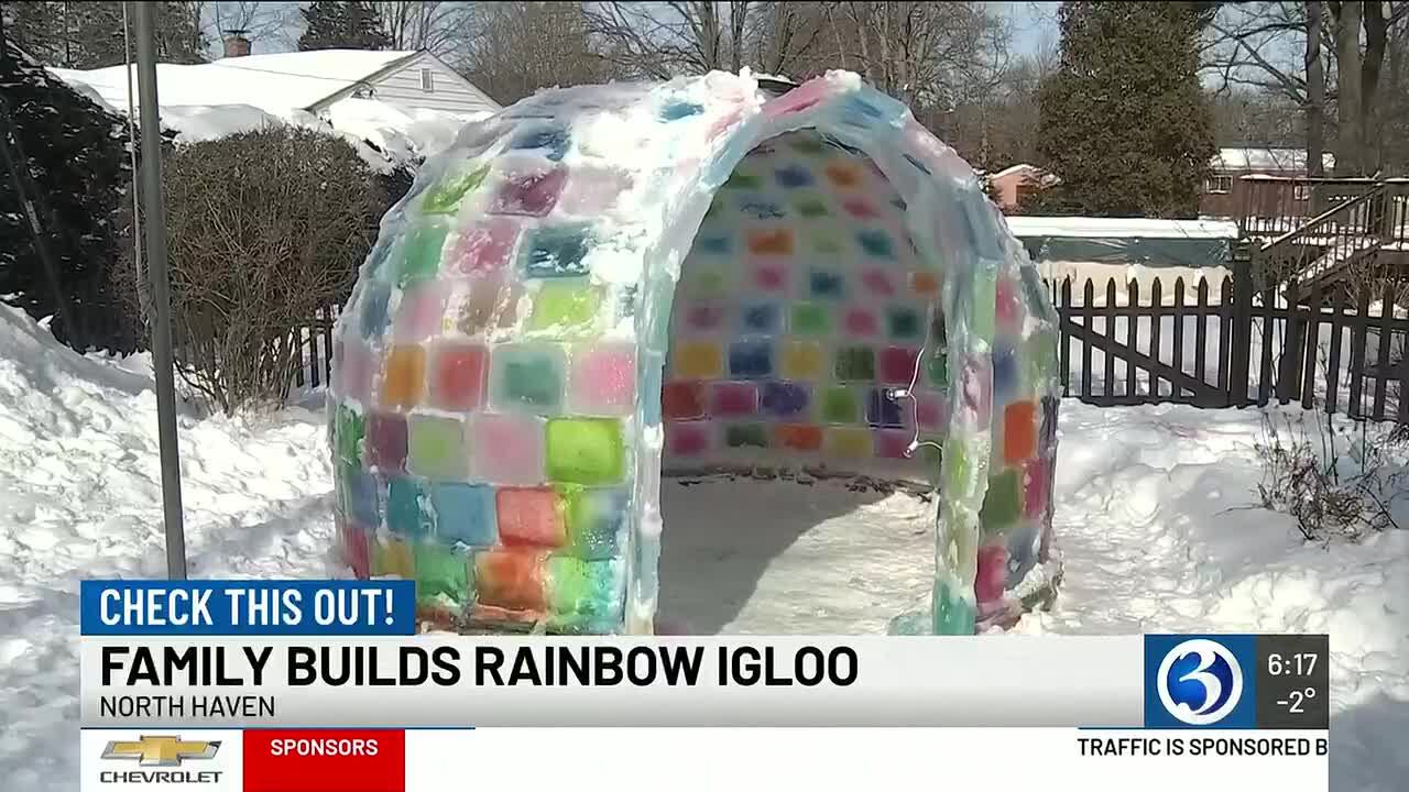 North Haven family makes the most of the cold by building rainbow igloo