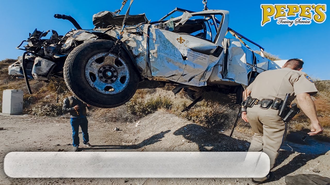 Ford F-350 crashes 450' down freeway hillside!