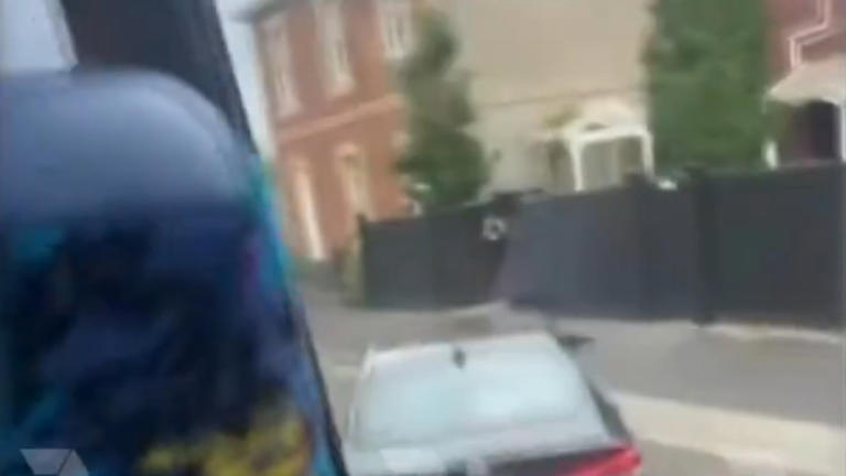 Gunfire erupts after car hits school bus