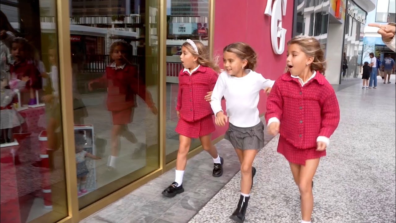 Twin girls react to dolls that are literally them