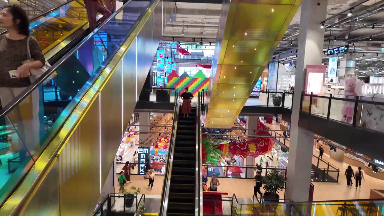 Colourful escalators and walkways are a hit at this shopping mall